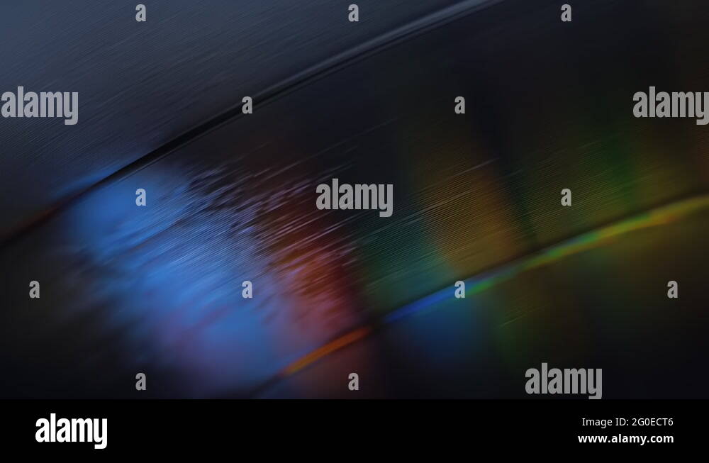 Structure, texture, surface pattern of vinyl disc. Color illumination ...