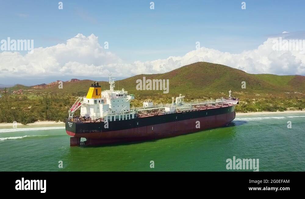 Drone Side View Ocean Washes Cargo Ship on Sand after Hurricane Stock ...
