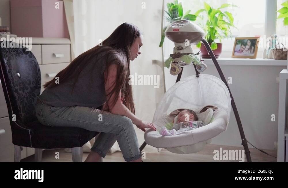 Cradle mother Stock Videos & Footage - HD and 4K Video Clips - Alamy