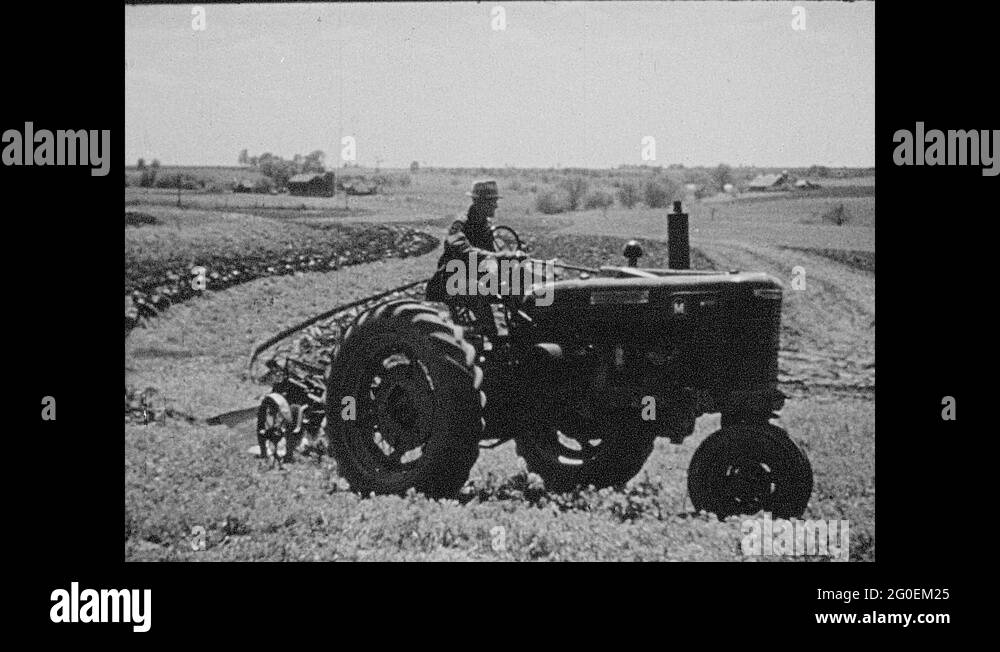 Man on tractor Stock Videos & Footage - HD and 4K Video Clips - Alamy