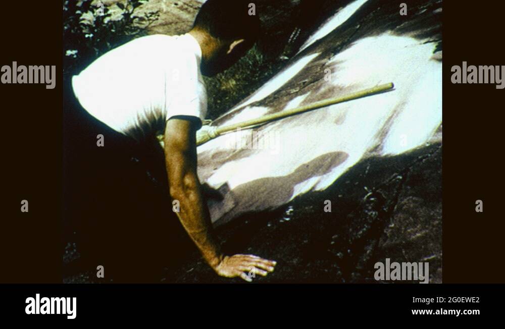 1960s: Crew scrubs graffiti off of Mt Rainier glacier rock. Trash in ...