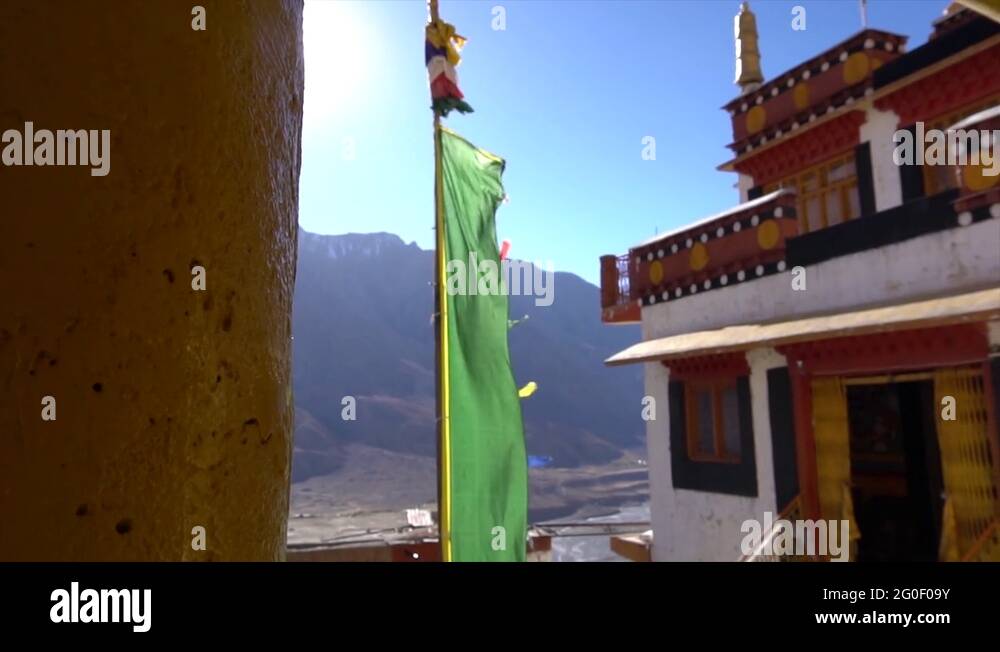 key monestary of Gompa in spiti valley interior shots of flag waving ...