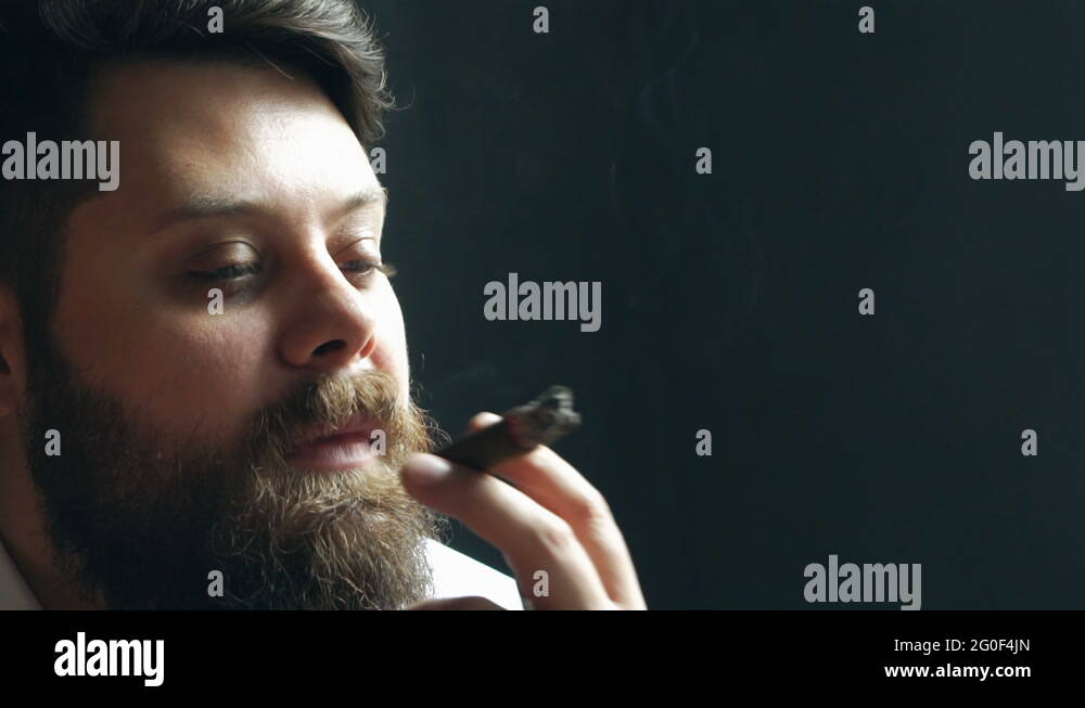 Man and cigar Stock Videos & Footage - HD and 4K Video Clips - Alamy