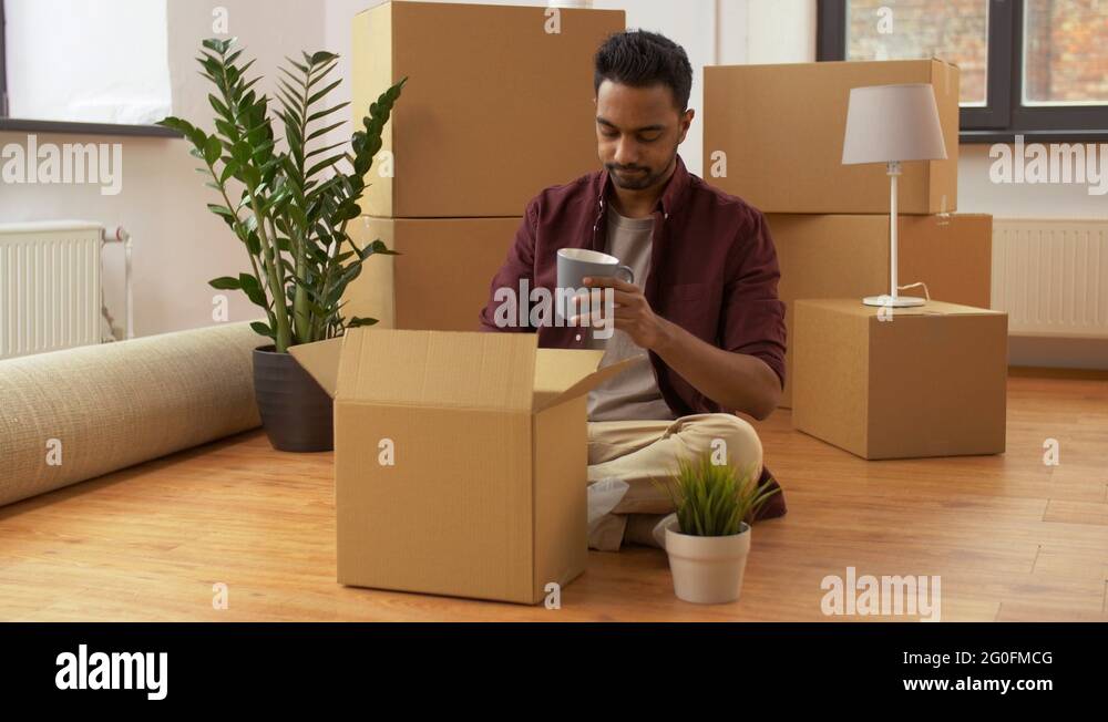 Man packing boxes Stock Videos & Footage - HD and 4K Video Clips - Alamy