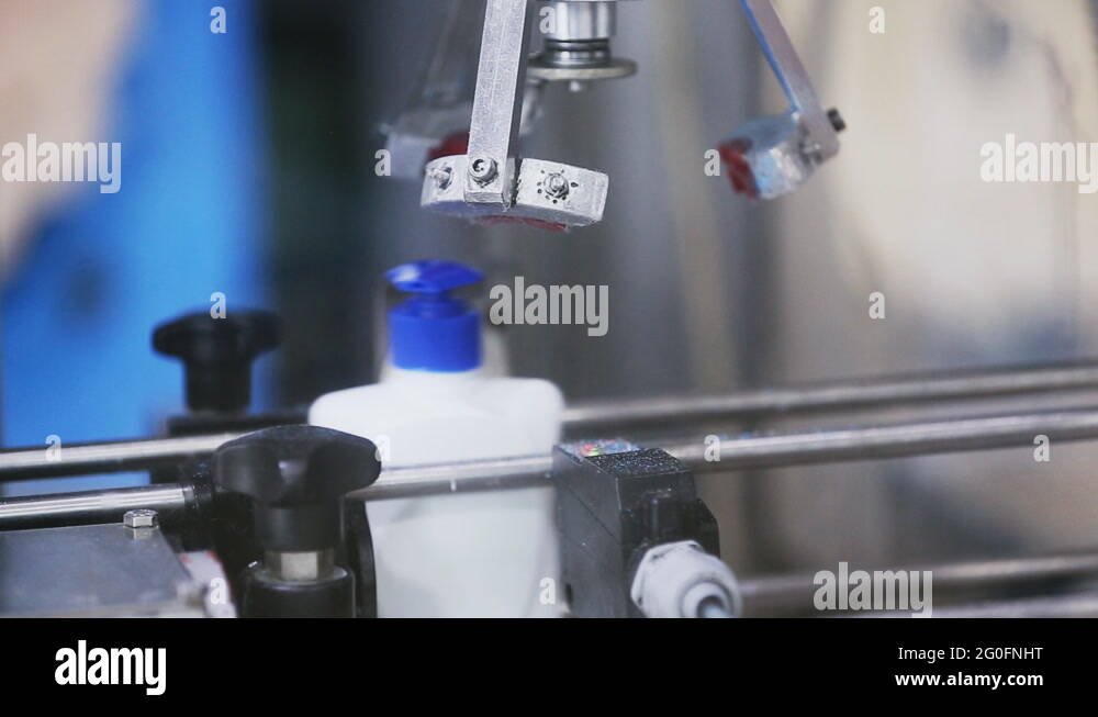 Capping machine Stock Videos & Footage - HD and 4K Video Clips - Alamy