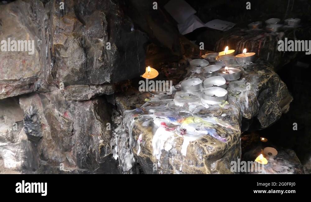 People light candles and leave notes with prayers in Rabbi Rashbi cave ...