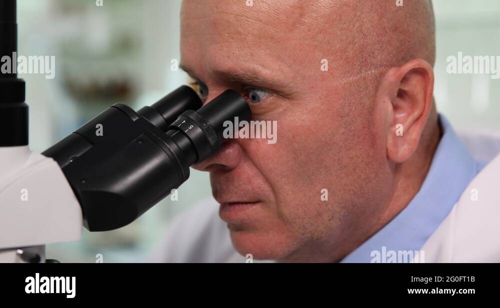 Pan View Scientist Looking Surprised Thru a Microscope Microbiology ...
