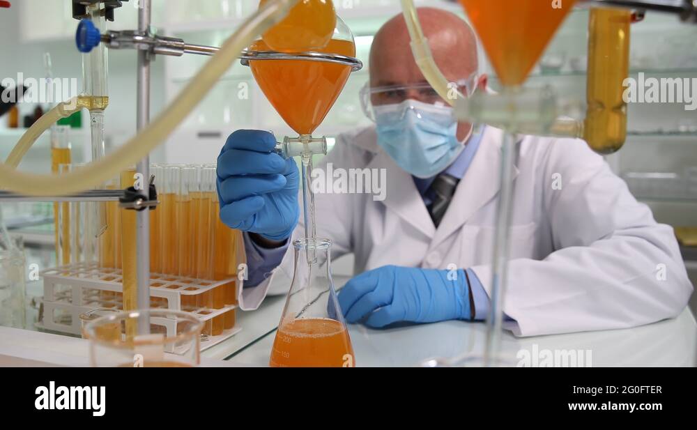 Scientist Working Using Chemical Laboratory Instruments in Pharmacology ...
