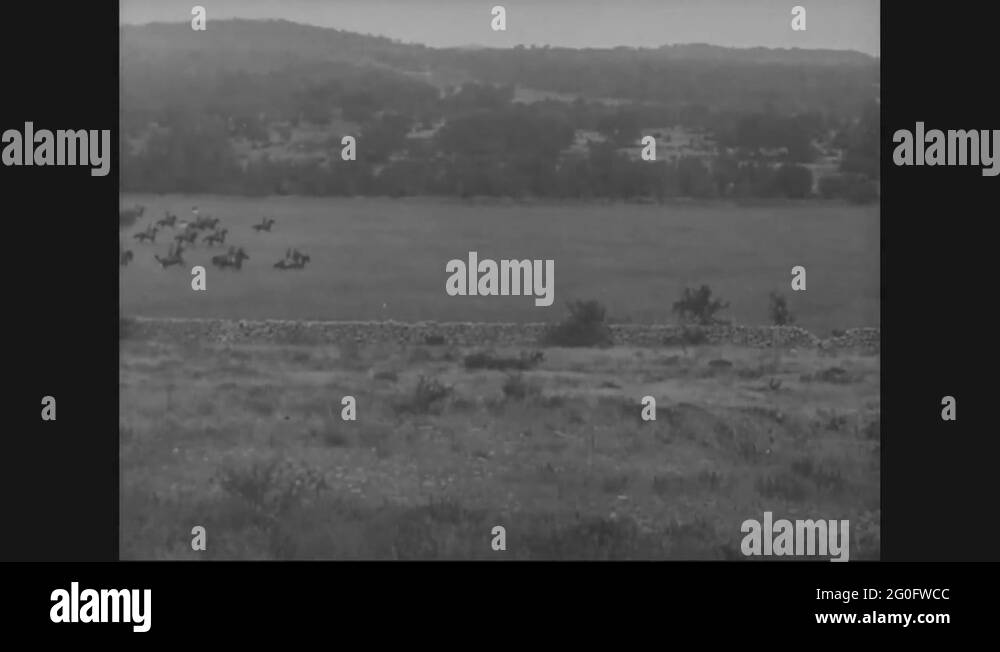 Cavalry runs across the field at Fort Sam Houston - 1917-1918 Stock ...