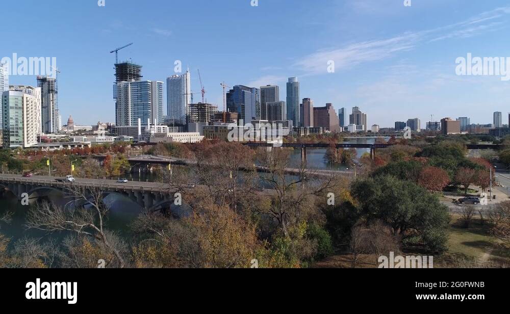 Rising Aerial View of Austin Skyline and Pfluger Pedestrian Bridge ...