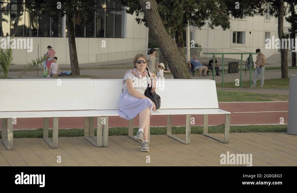 Seats on the bench Stock Videos & Footage - HD and 4K Video Clips - Alamy