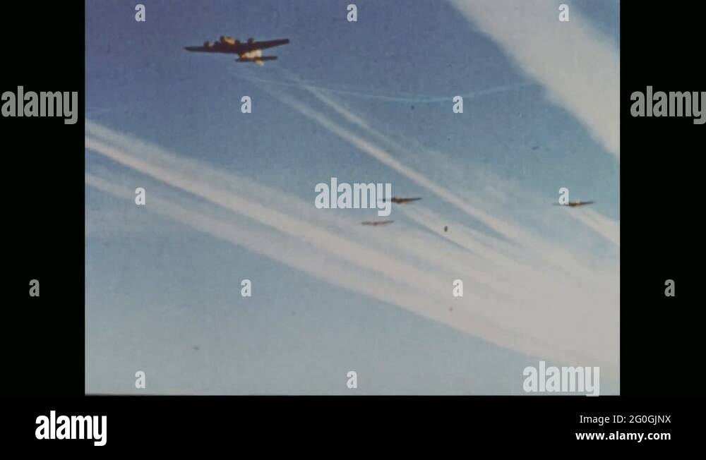 WW2 - B-17 aircrafts Flying Fortress fly in formation with con trails ...