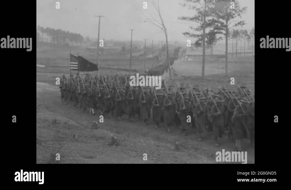 Troops march through the street in a long procession - 1918 Stock Video ...