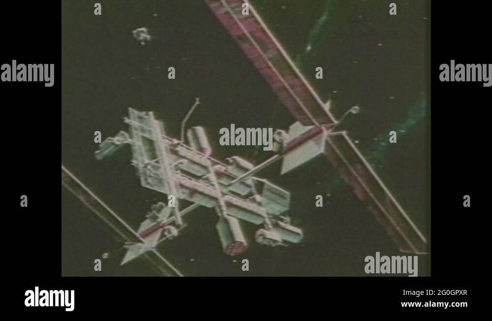 1980s: Illustrations of space station and Space Shuttle docked to it ...