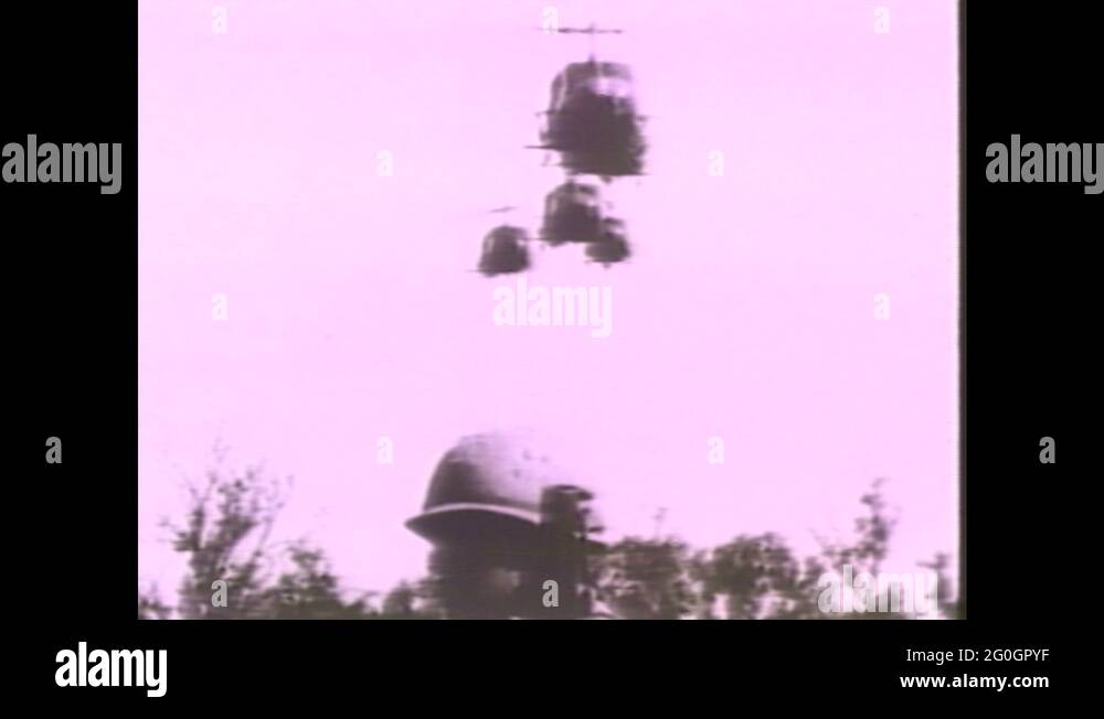 1980s: Helicopters come in for landing. Soldier loads gun. Israeli flag ...