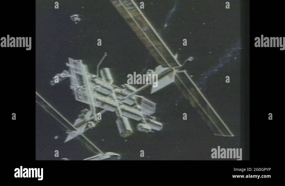 1980s: Illustration of space station. Illustration of space shuttle ...