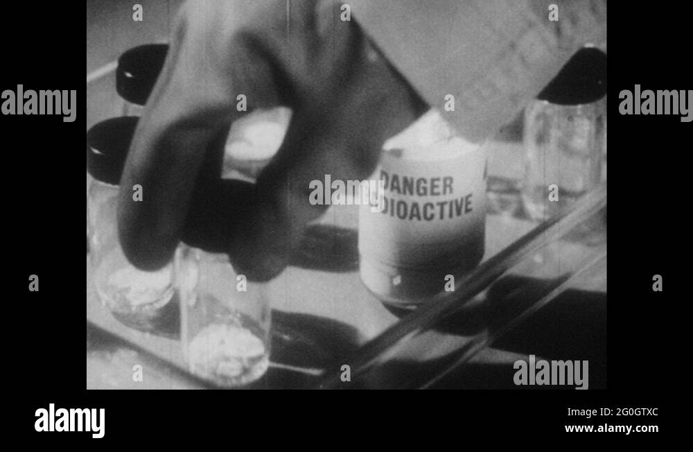 1950s: UNITED STATES: Danger radioactive label on container. Powder ...