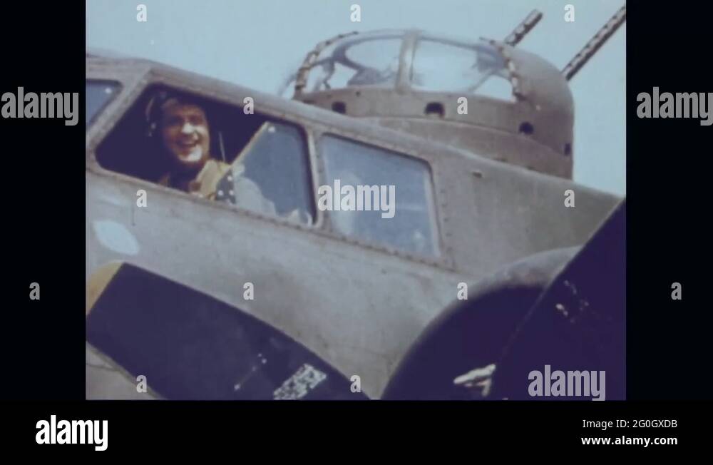 WW2 - B-17 flying fortress pilot look out of the cockpit Stock Video ...