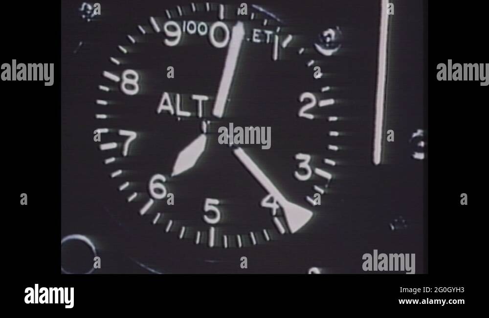 1980s: Needle on altimeter gauge moves. Tail of jet as it flies through ...