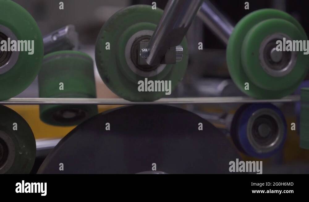 Industrial machine, view of rotating rollers and wheels, production ...