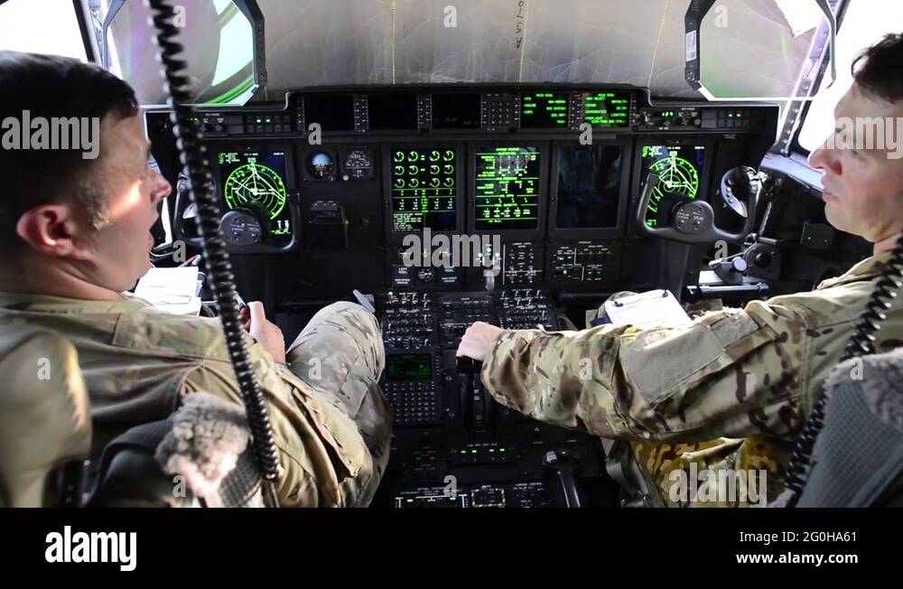Pilots discussing while they are seated in the cockpit of AC-130 - 2017 ...