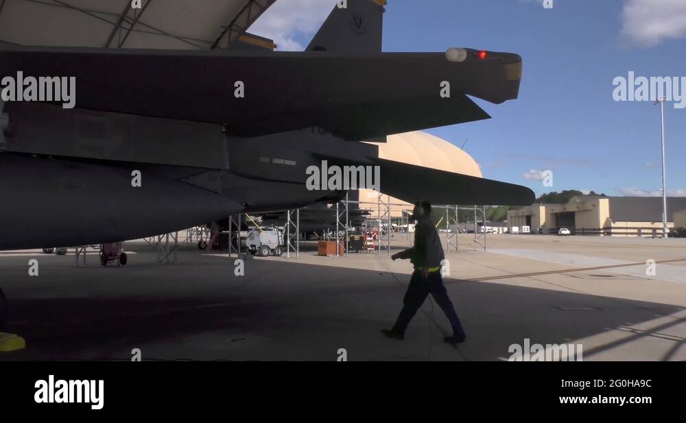 Crew check the wing flaps of F-15E Strike Eagle before take off - 2017 ...