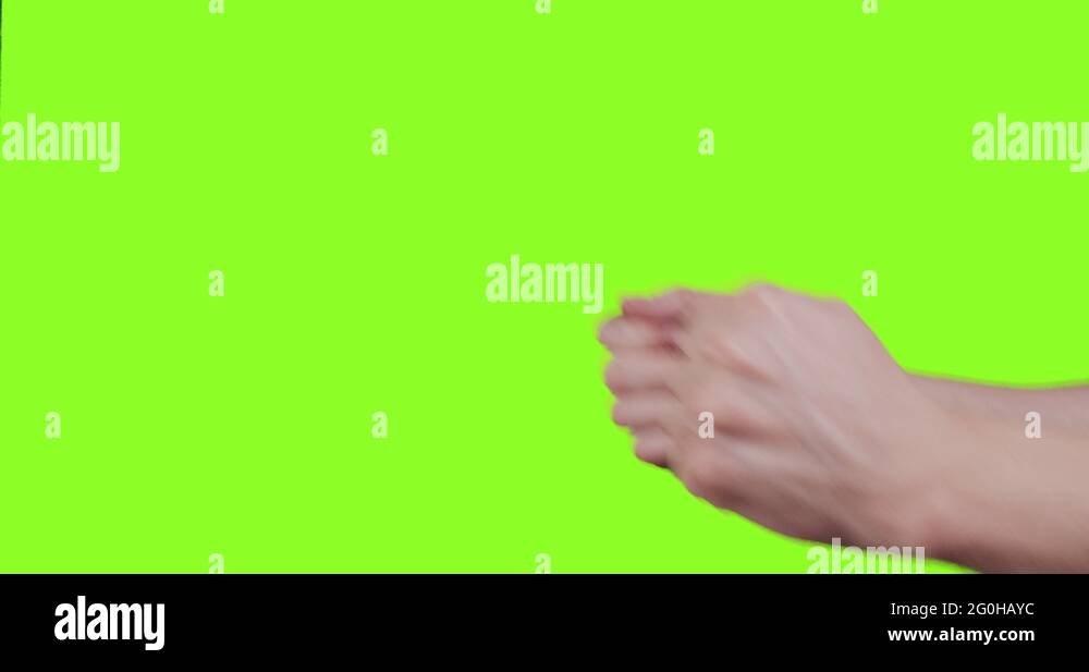 adult young man hand clapping over green screen in slow motion Stock ...
