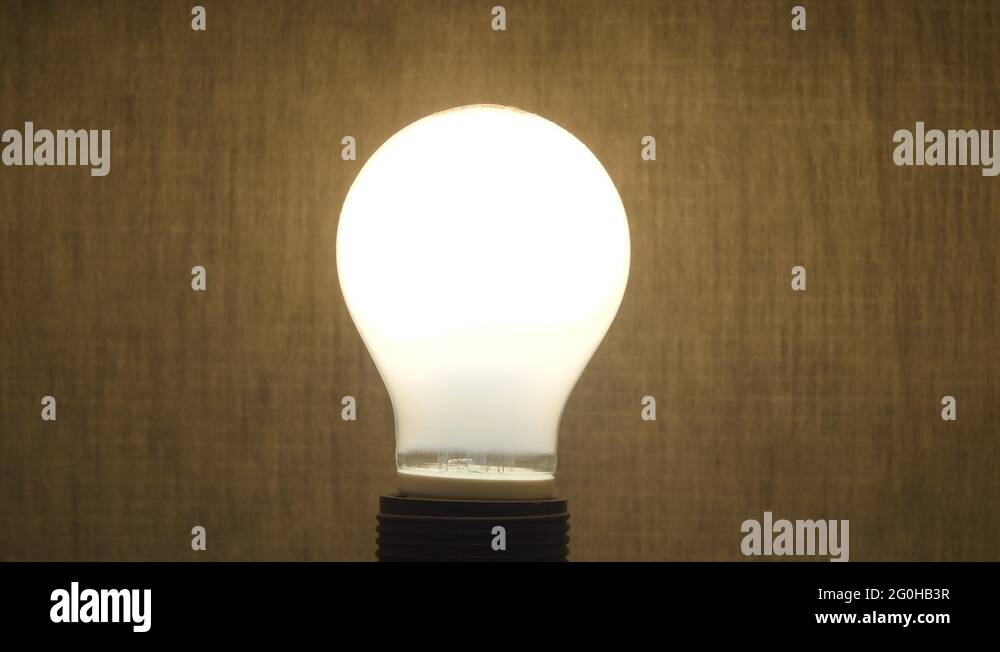 Light bulb turning on Stock Video Footage - Alamy