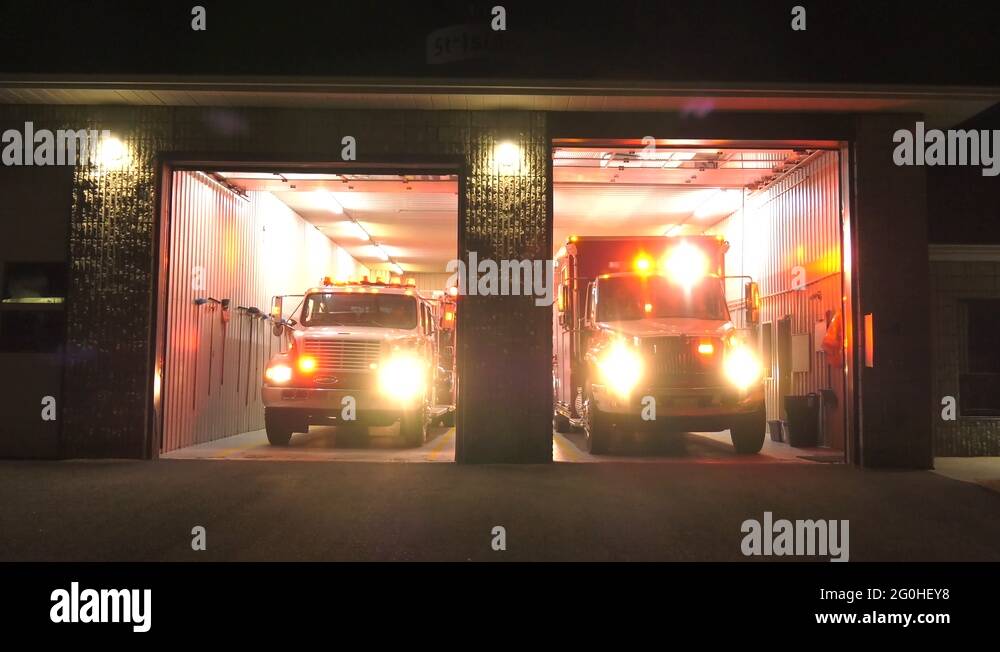 firetrucks leave fire station garage 4k Stock Video Footage - Alamy
