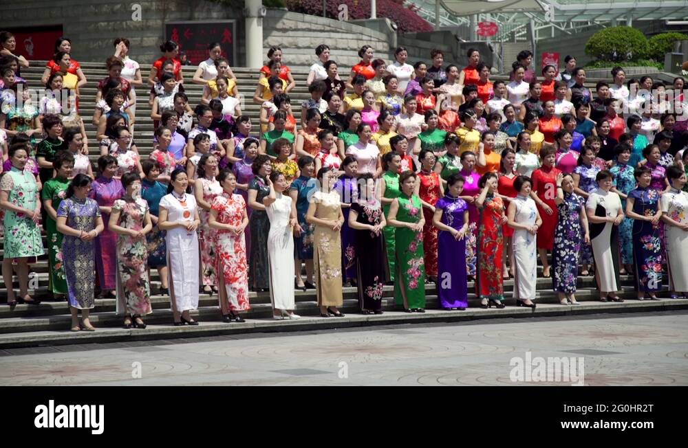 Big Female Choir in Shanghai , dressed in traditional dresses singing ...