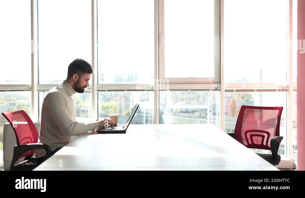 Man coming to workplace and starting to work Stock Video Footage - Alamy