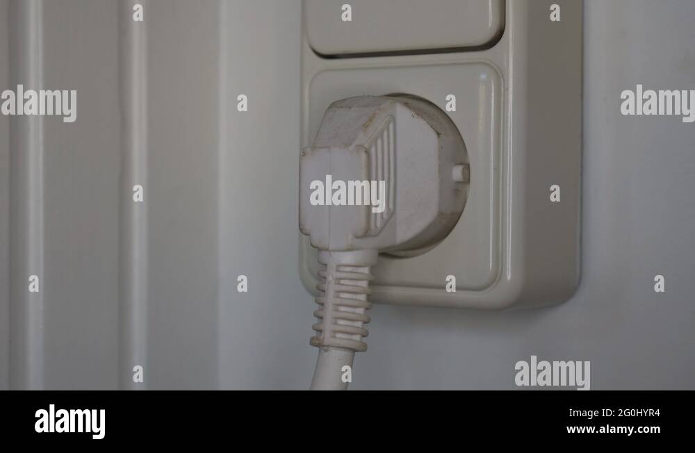 Plugs into wall Stock Videos & Footage - HD and 4K Video Clips - Alamy