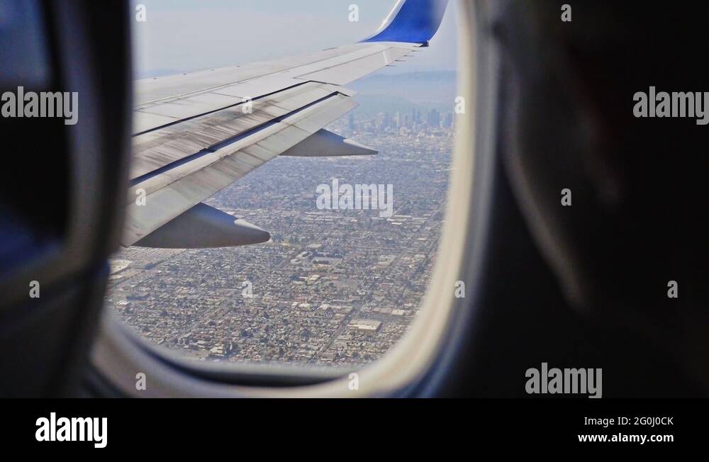 Airplane Window Downtown Los Angeles Boy Looks Out Landing LAX Stock ...