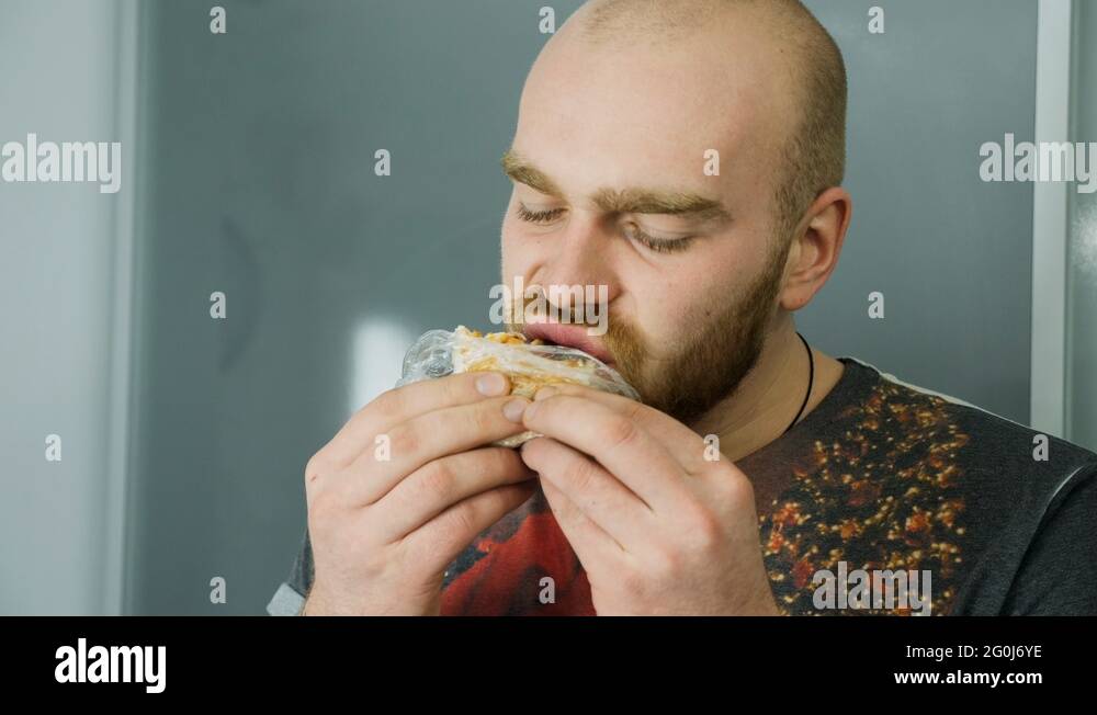 Man eating sandwich standing Stock Videos & Footage - HD and 4K Video ...
