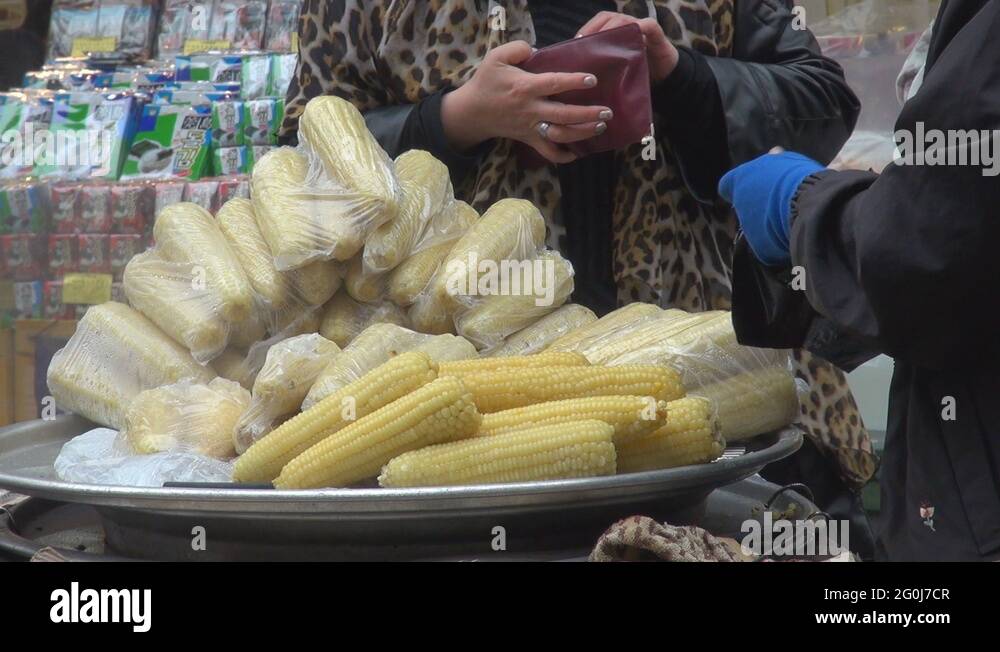 Woman selling corn Stock Videos & Footage - HD and 4K Video Clips - Alamy