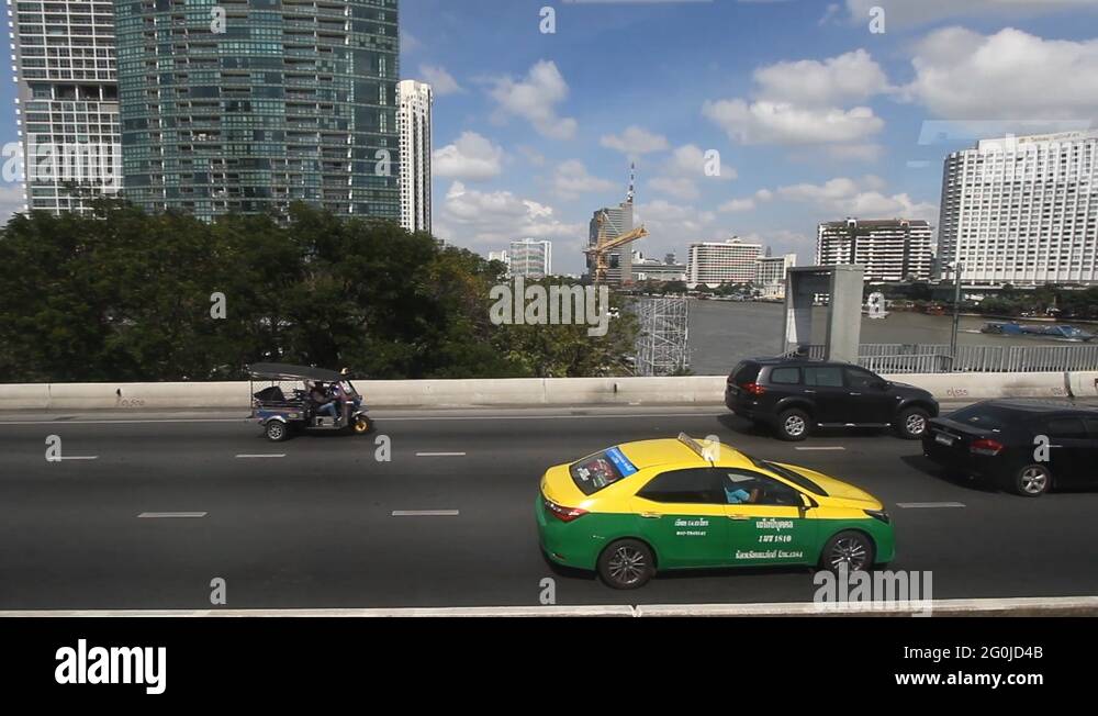 Bangkok, Thailand. City view out of the window of a moving train Stock ...