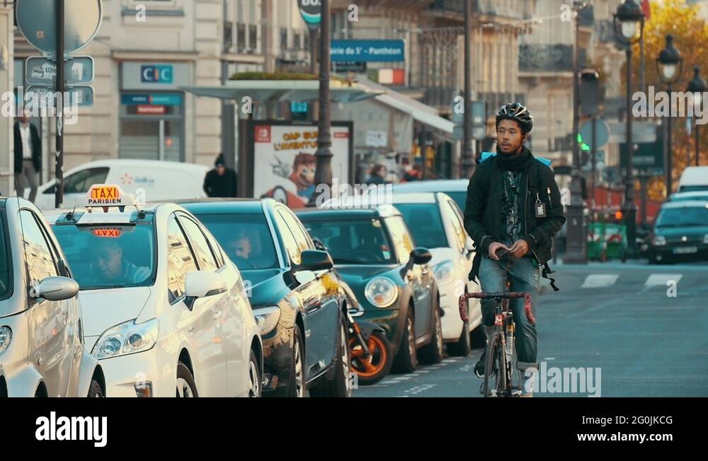 Paris cyclist cars Stock Videos & Footage - HD and 4K Video Clips - Alamy