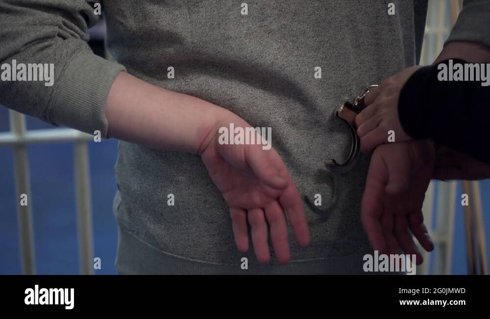 Prison Guard Puts Handcuffs On Inmate, 4K Incarceration In Genuine ...