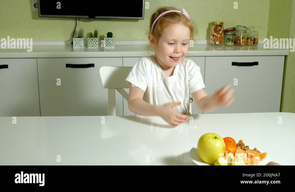 Little girl eating fruit Stock Videos & Footage - HD and 4K Video Clips ...