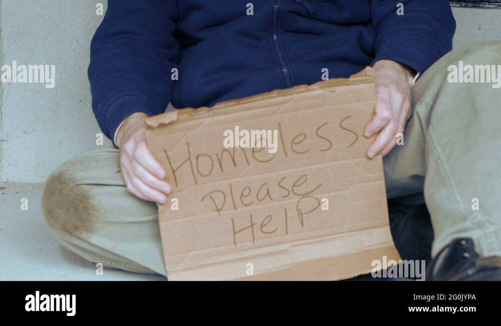 Cardboard sign man Stock Videos & Footage - HD and 4K Video Clips - Alamy