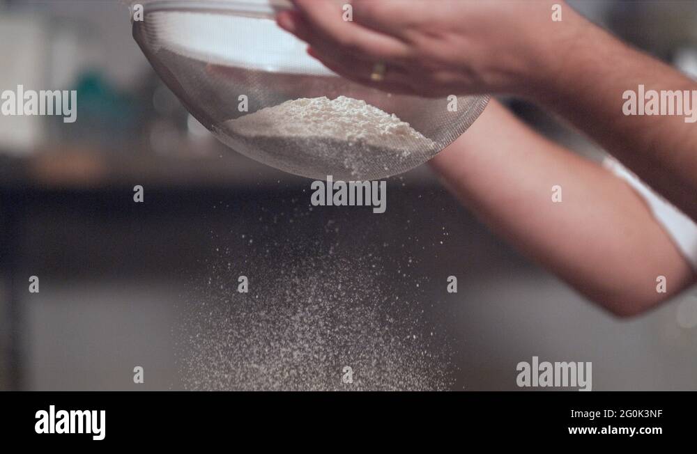Sieving flour Stock Videos & Footage - HD and 4K Video Clips - Alamy