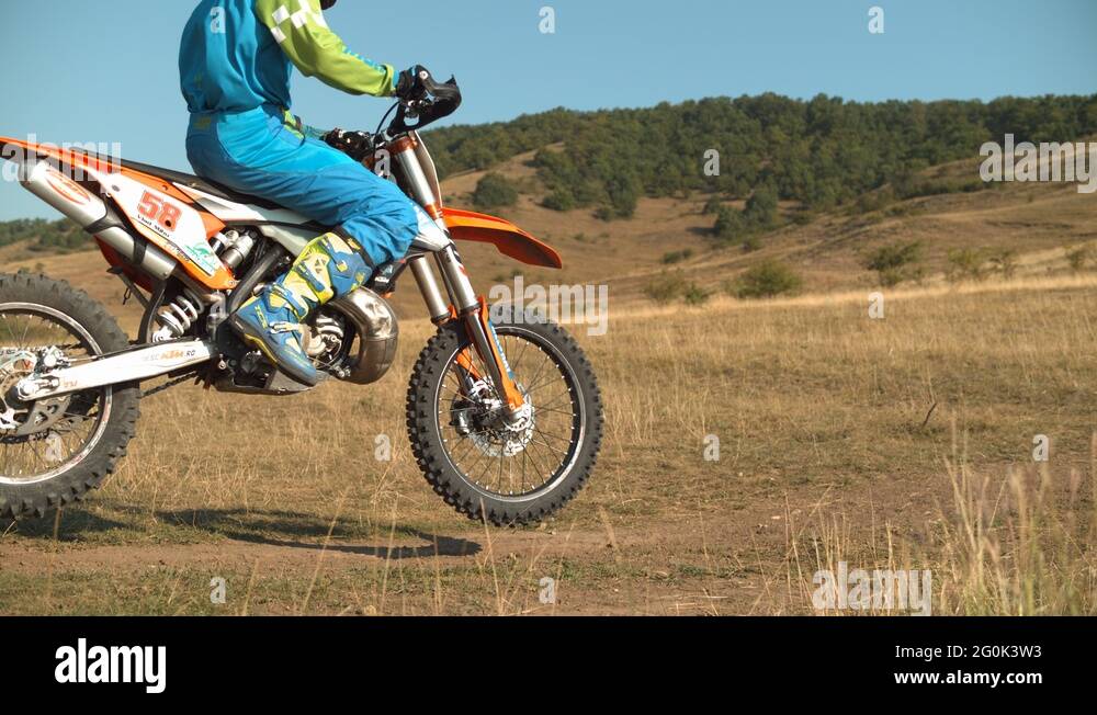 Motocross rider on his motorcycle Stock Video Footage - Alamy