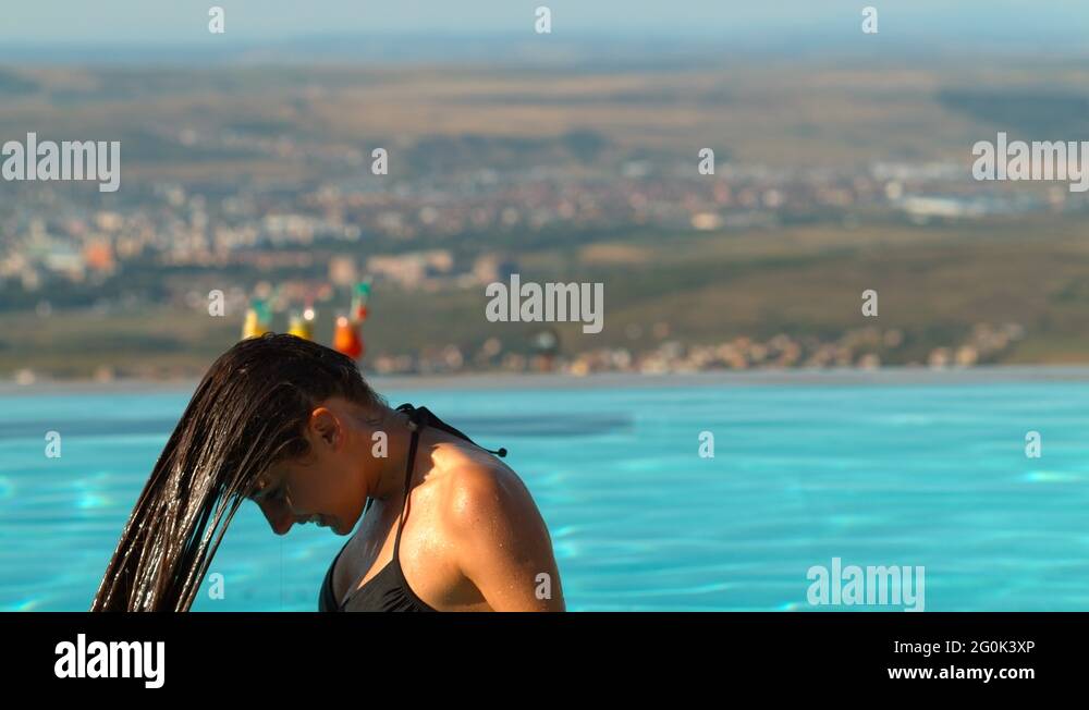 Woman throwing hair back water Stock Videos & Footage - HD and 4K Video ...