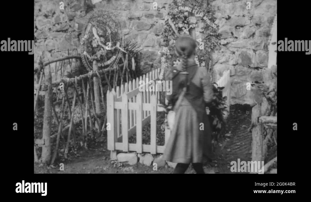 Girls of Alsace town decorate the grave with flowers and pay homage ...