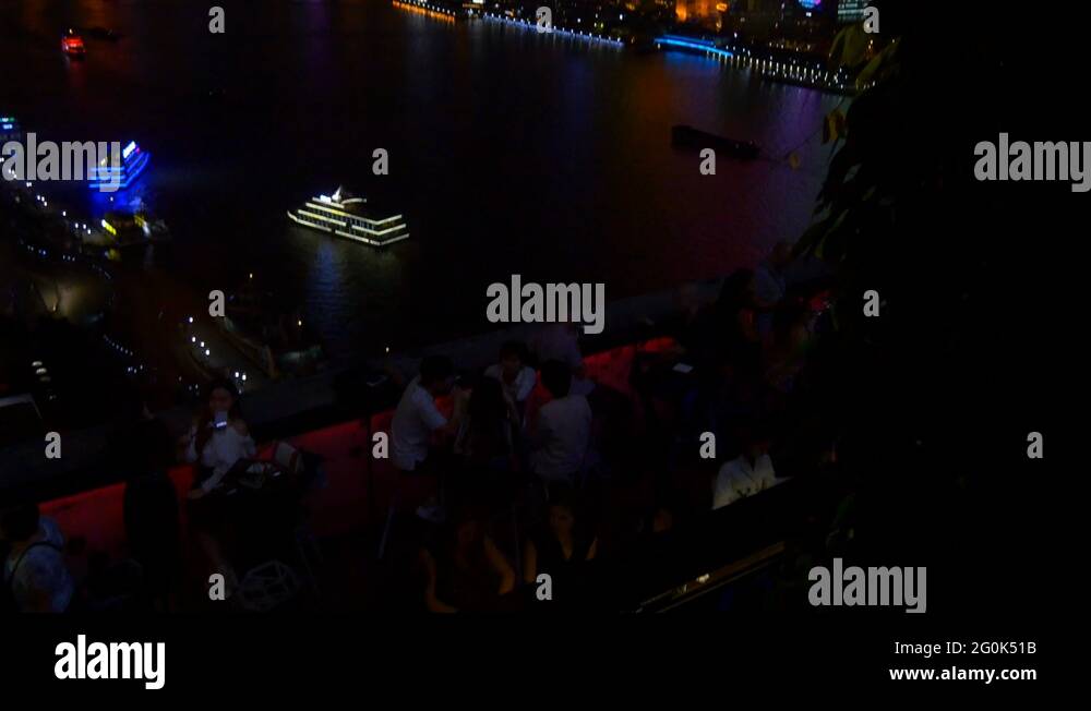 night time shanghai hotel rooftop bar terrace riverside view 4k china ...
