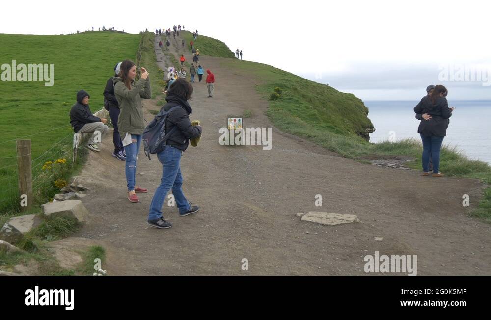 People at Cliffs of Moher Stock Video Footage - Alamy