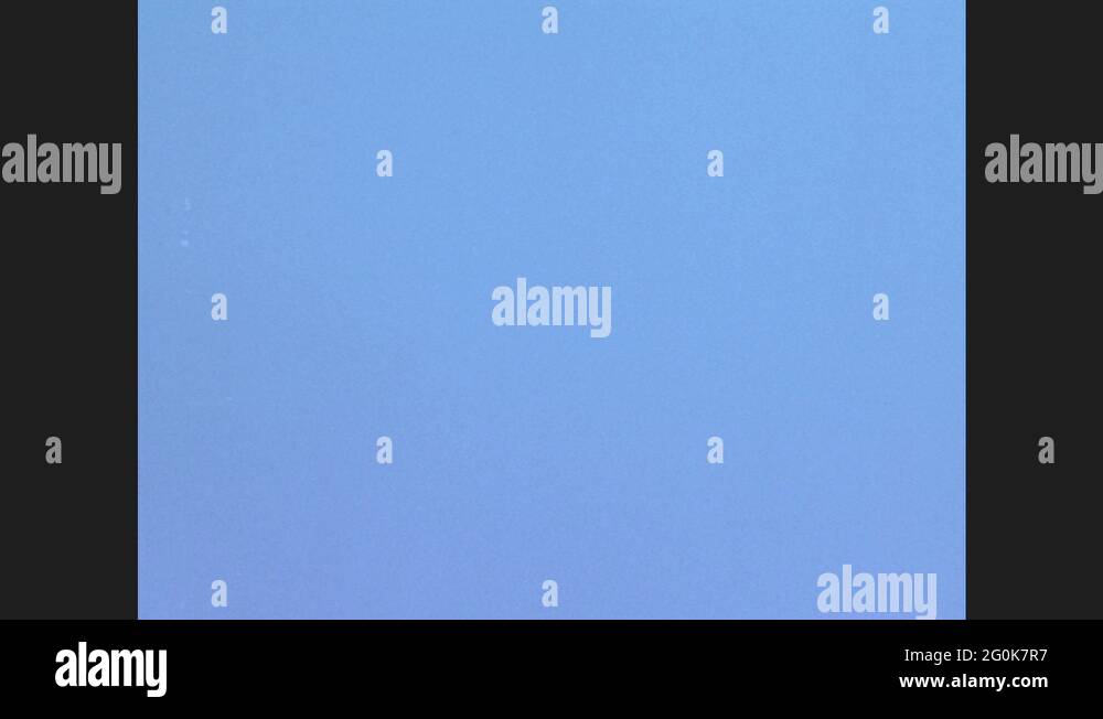 1980s: UNITED STATES: blue screen. Absorbance of blue on graph. Yellow ...