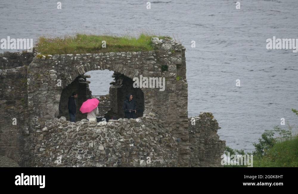People inside stone ruins Stock Video Footage - Alamy