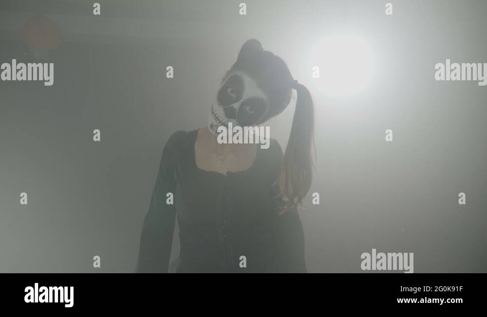 Halloween carnival creepy hell doll skull woman wearing black dress and ...