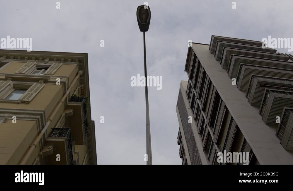 Low angle of two buildings and a lamp post Stock Video Footage - Alamy